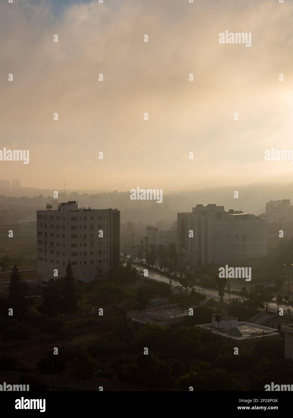 Foggy Ramallah Cityscape at Dawn Facing the Sun at Sunset, High ...