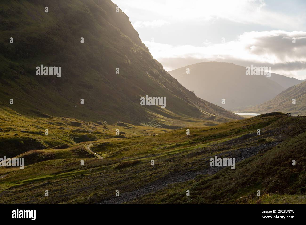 Landscape in the valley of Glen Coe at sunset in the Scottish highlands ...