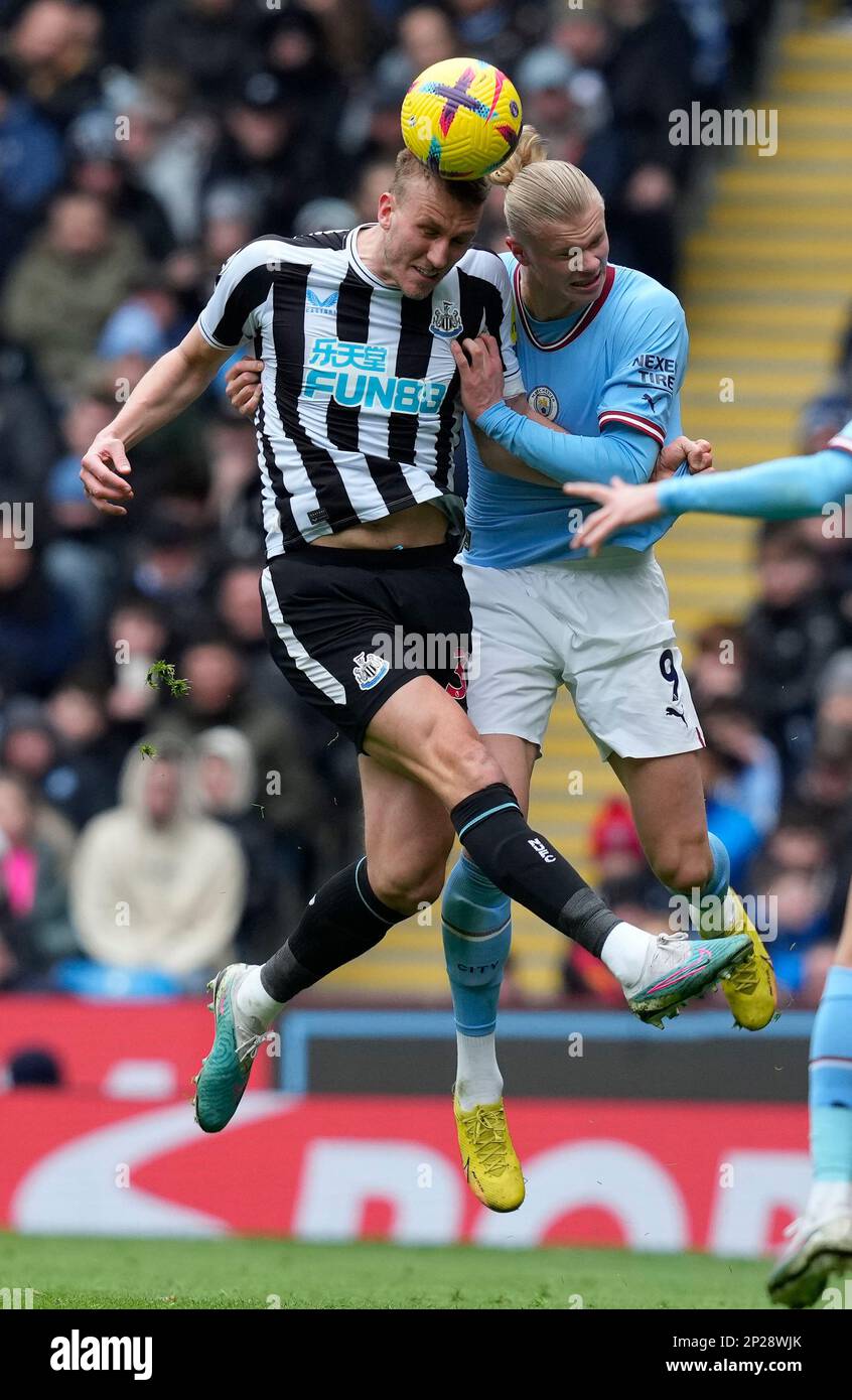 Manchester, England, 4th March 2023. Dan Burn of Newcastle United (L ...