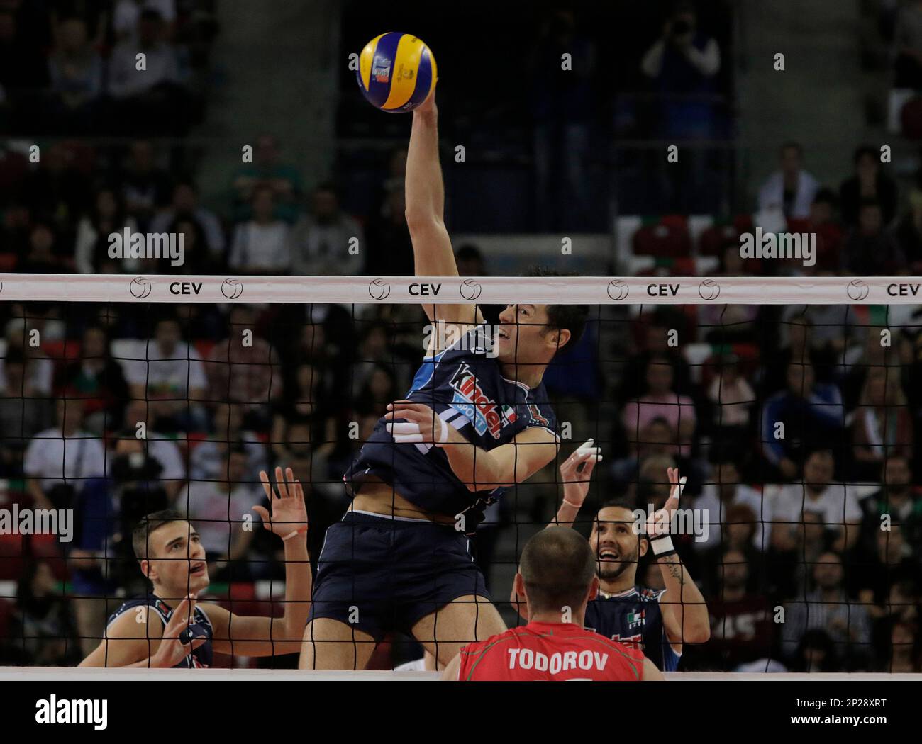 Italy's Simone Buti, top, scores against Bulgaria's Teodor Todorov ...