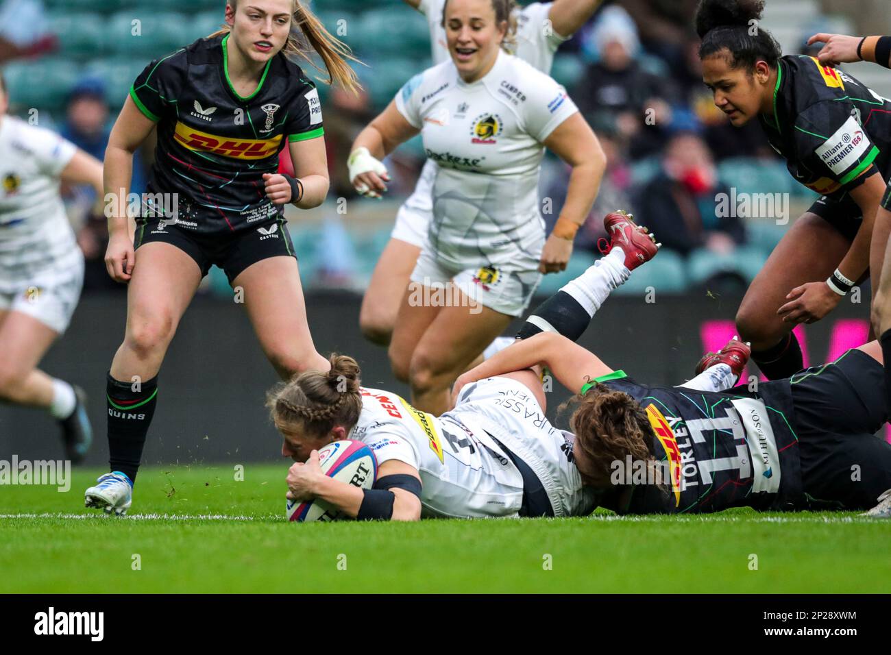 Exeter Chiefs' Kate Zackary scores a try despite the efforts of ...