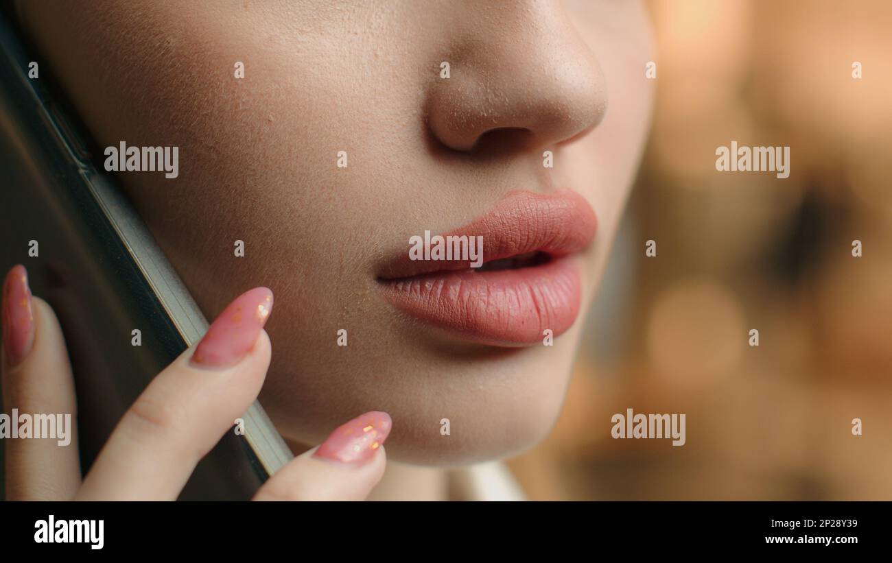 Mobile conversation unrecognizable woman talking mobile phone indoors ...