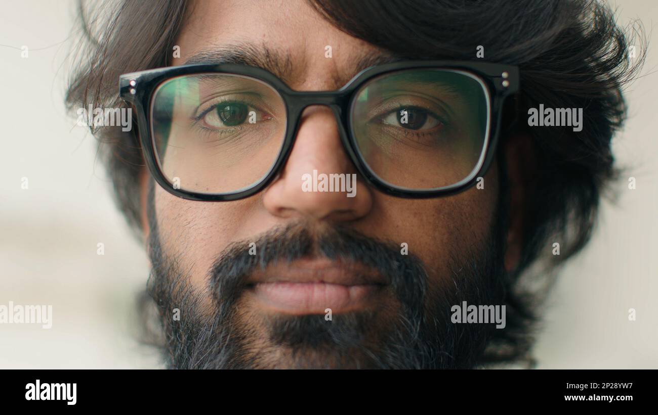 Close up front male face looking at camera Arabian Indian adult middle ...