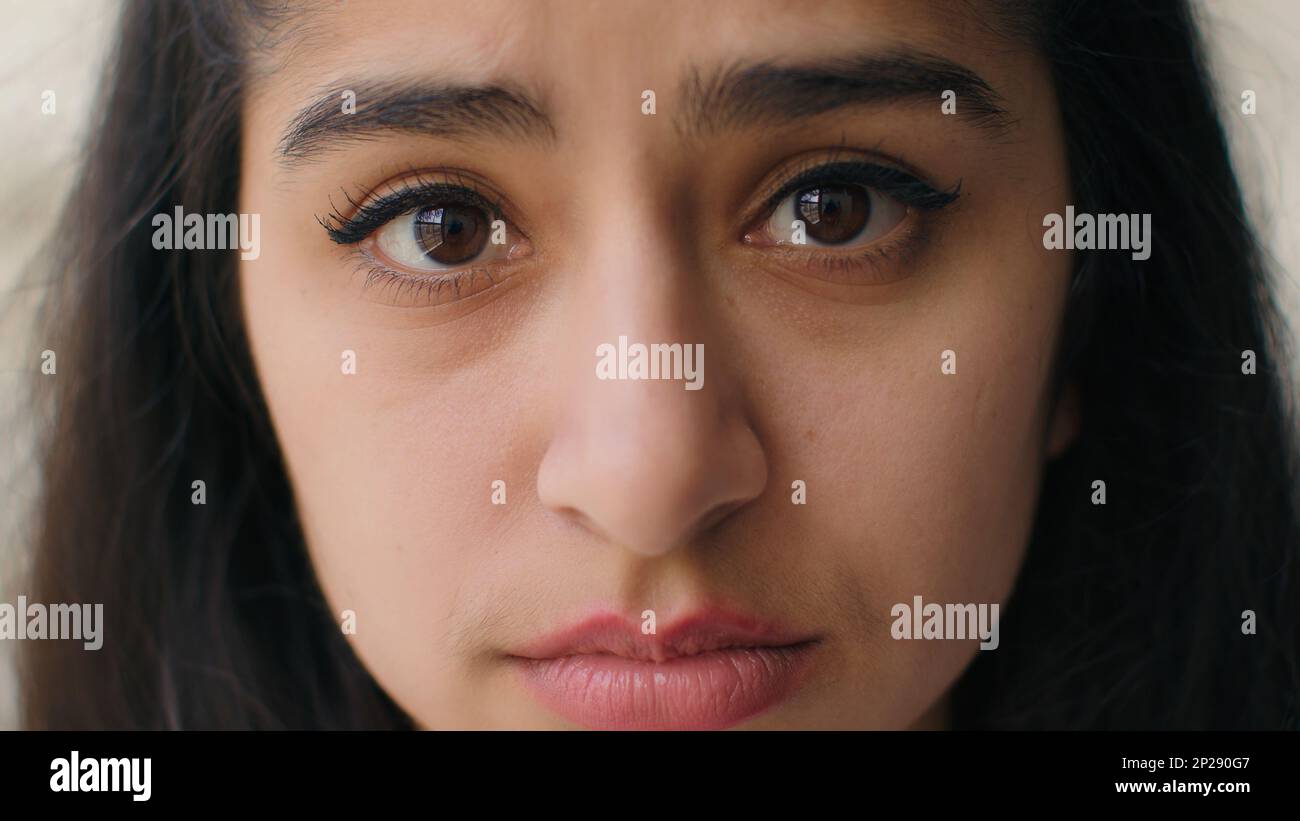 Close up woman sad face with big eyes anxious upset frustrated young ...