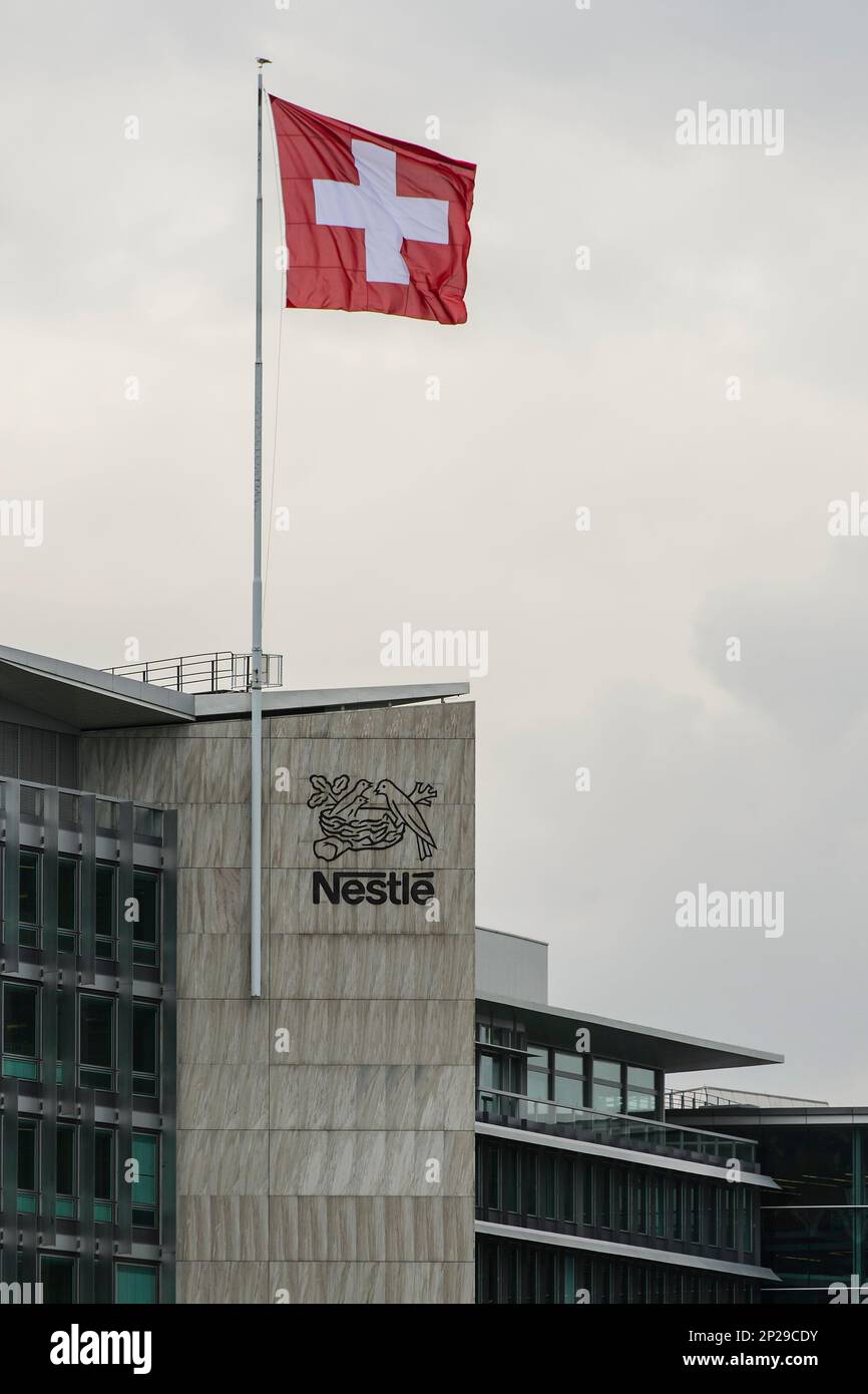 The Swiss flag is pictured on Nestle's headquarters building during a ...