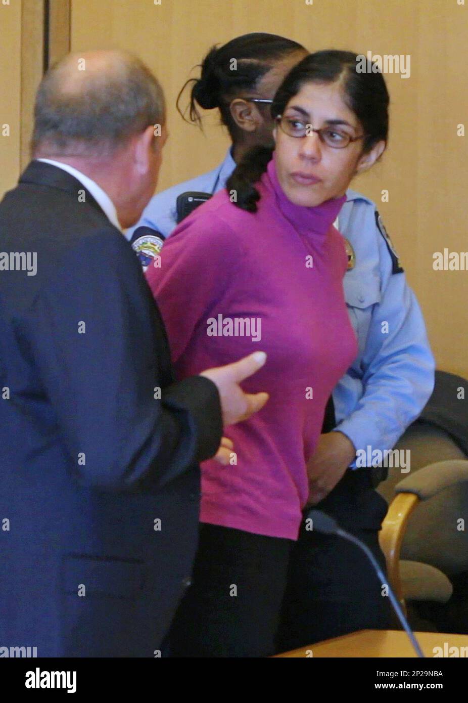 FILE - In this April 27, 2012 file photo, Sheila Davalloo looks back at ...