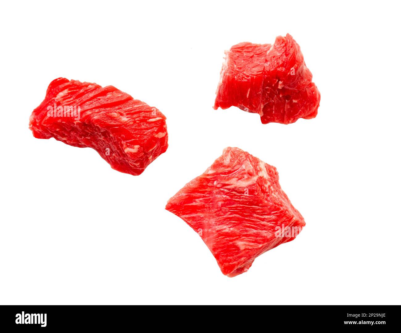 Three slices of raw beef meat isolated on white, clipping path Stock ...