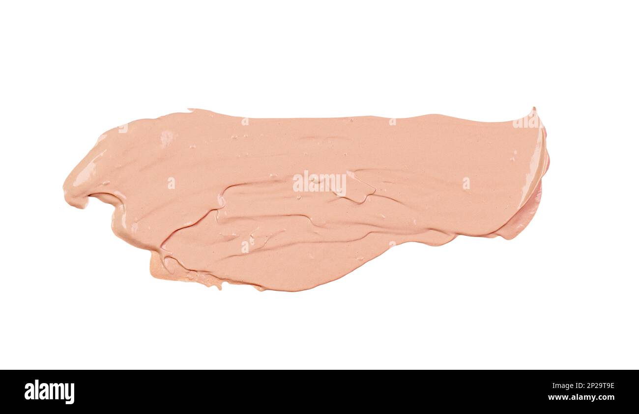 Abstract smear of beige makeup foundation, tonal cream isolated on ...