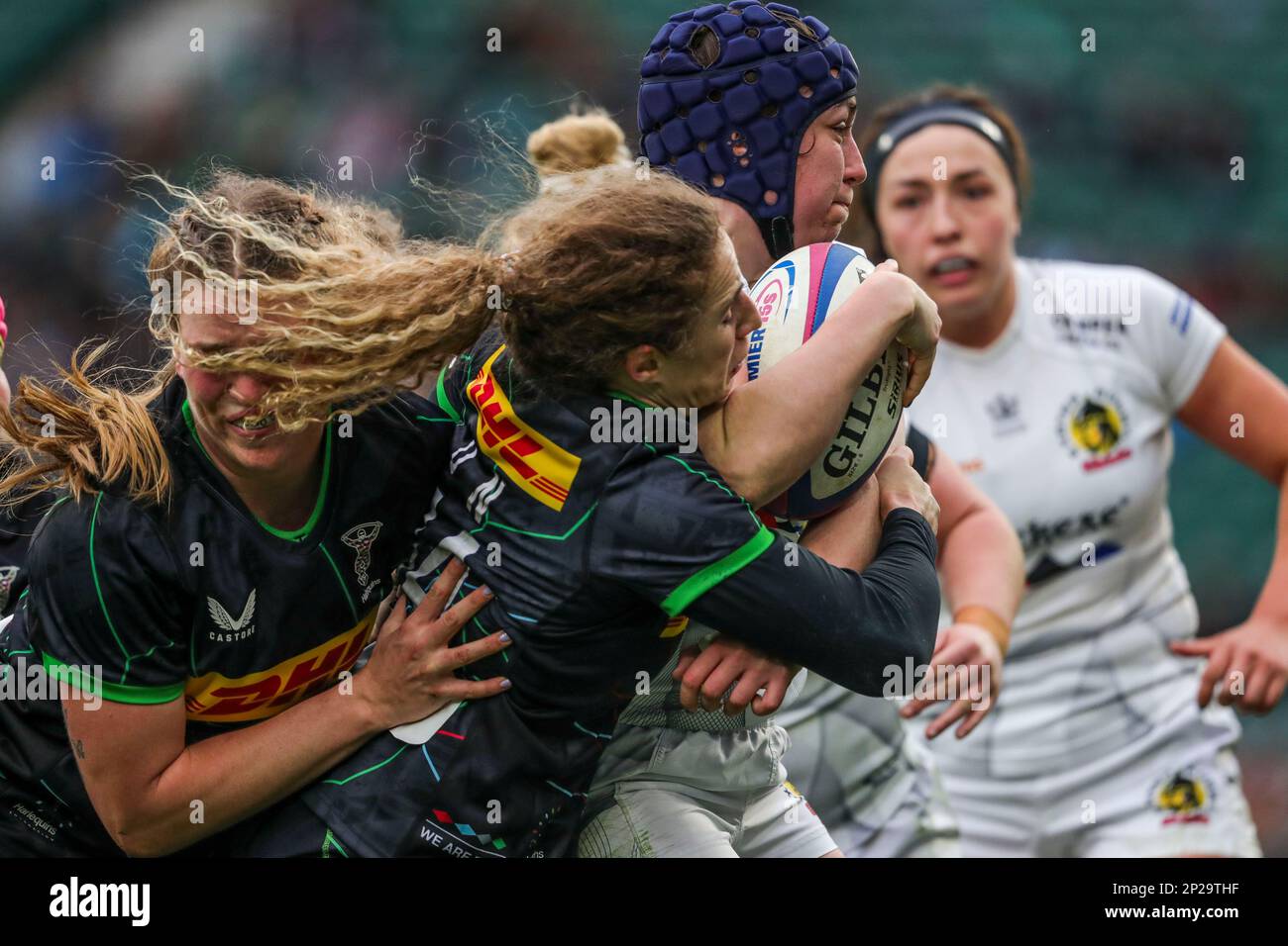 Exeter Chiefs' Ebony Jefferies tackled by Harlequins' Abby Dow during ...