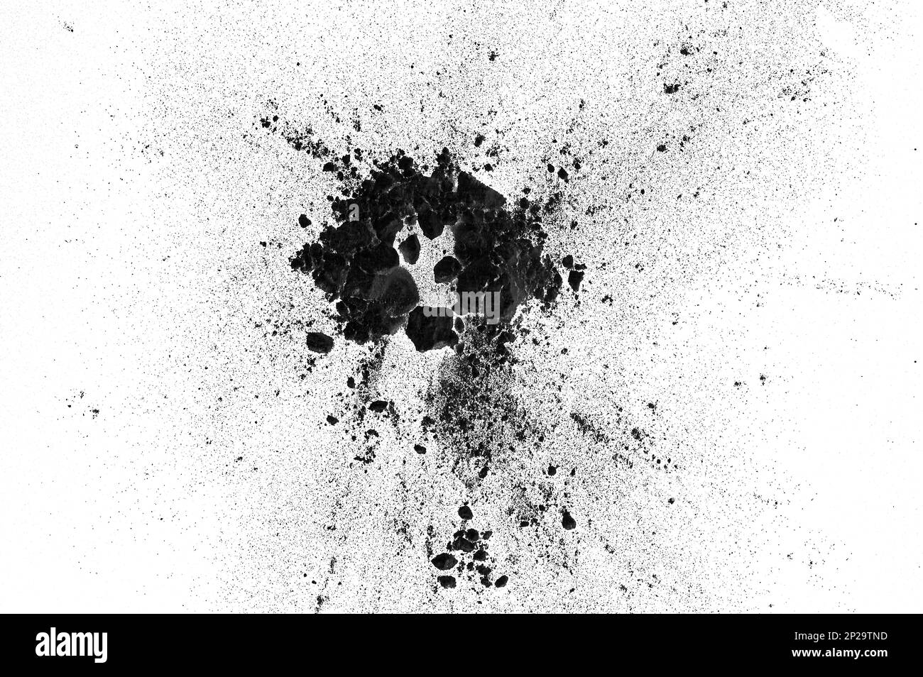 Powder with ash and dust splashing with pieces of dirt and coal ...