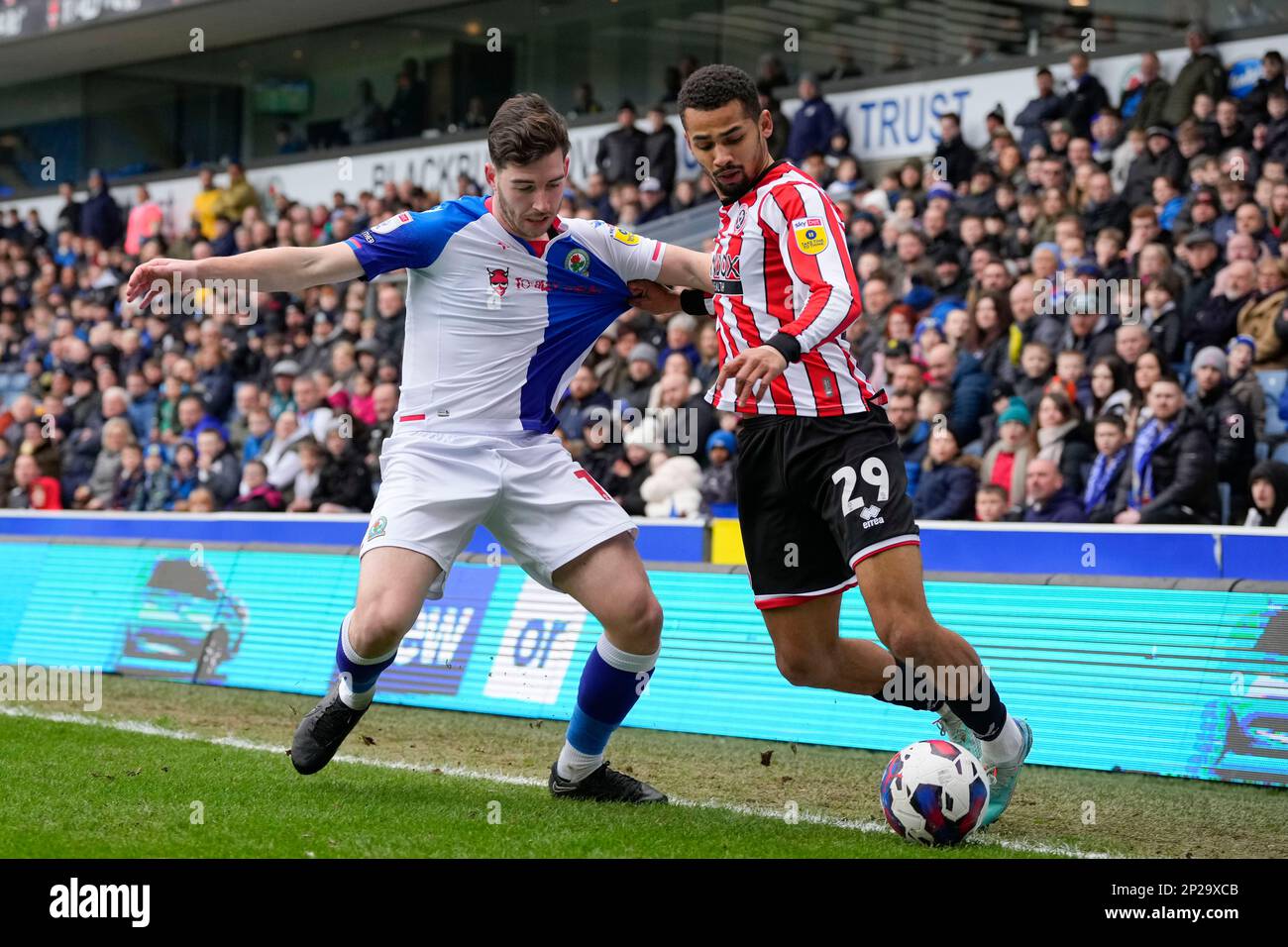 Joseph Rankin Costello #11 of Blackburn Rovers competes for the ball ...