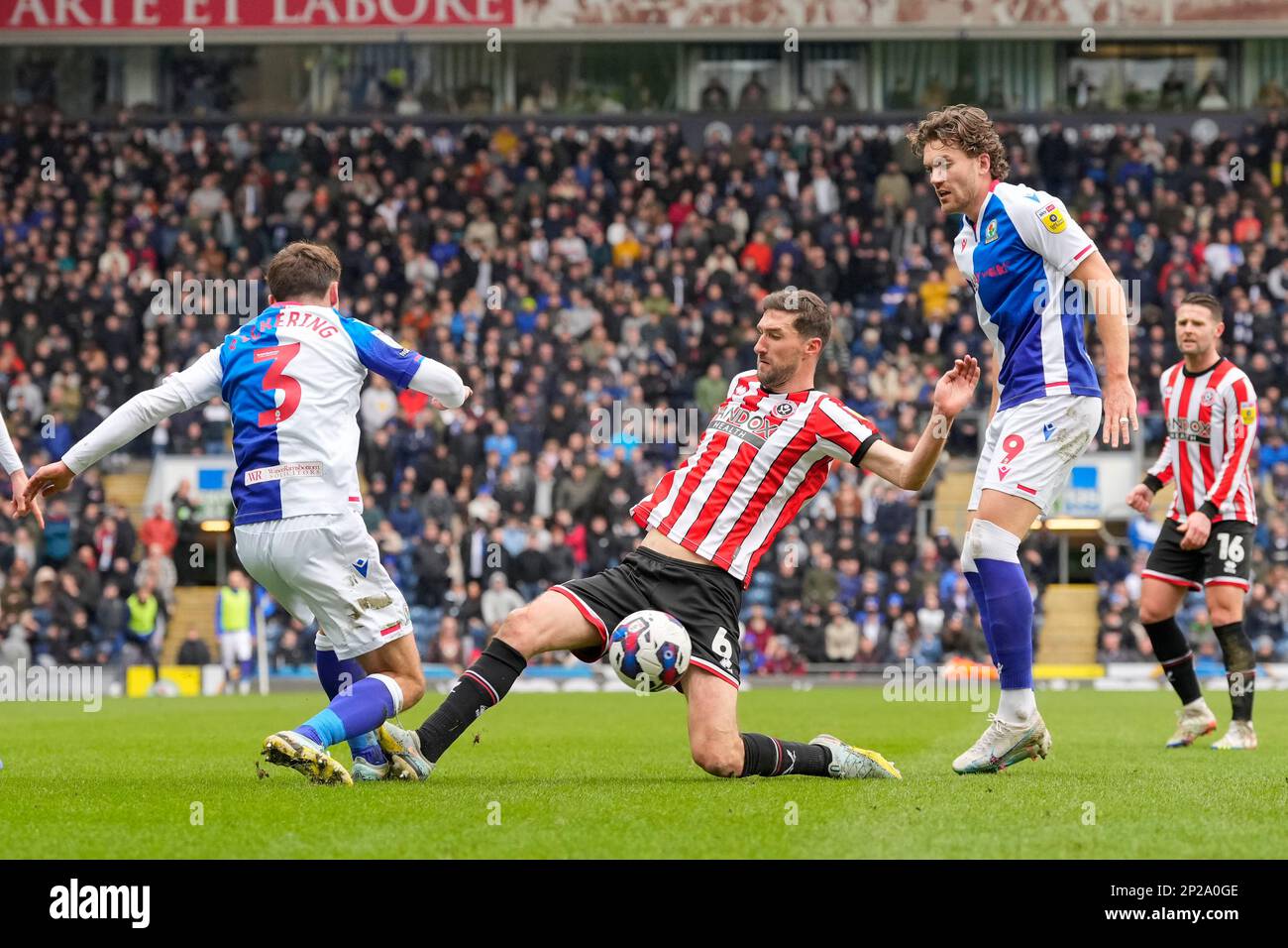 Chris Basham #6 of Sheffield United fouls Harry Pickering #3 of ...