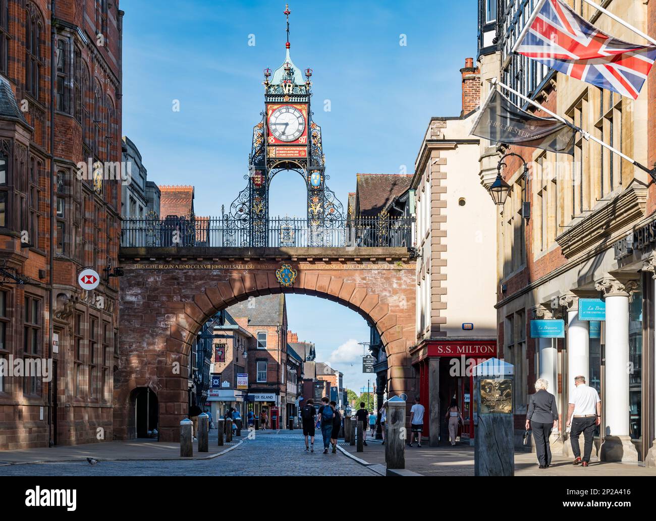Historic ornate Victorian East gate clock on arched bridge of city ...