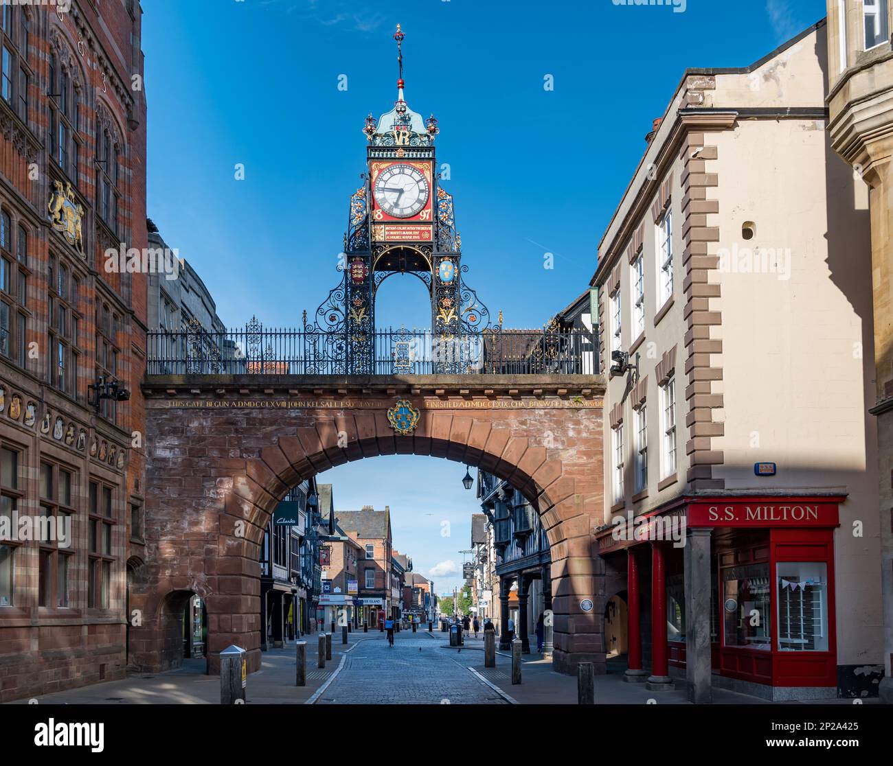 Historic ornate Victorian East gate clock on arched bridge of city ...