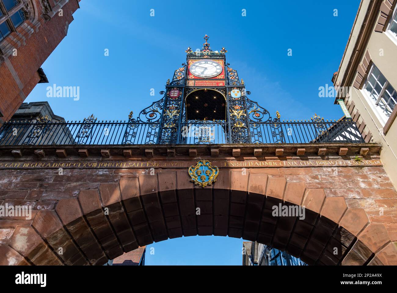 Historic ornate Victorian East gate Clock on arched bridge of city ...
