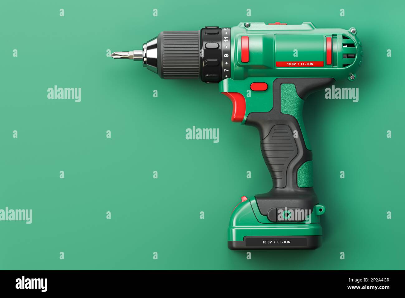 Green electric screwdriver drill on green background with space for ...