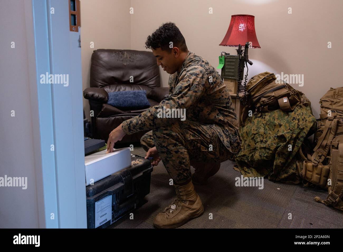 U.S. Marine Corps Cpl. Enrique L. Mendiola, a radio operator with ...