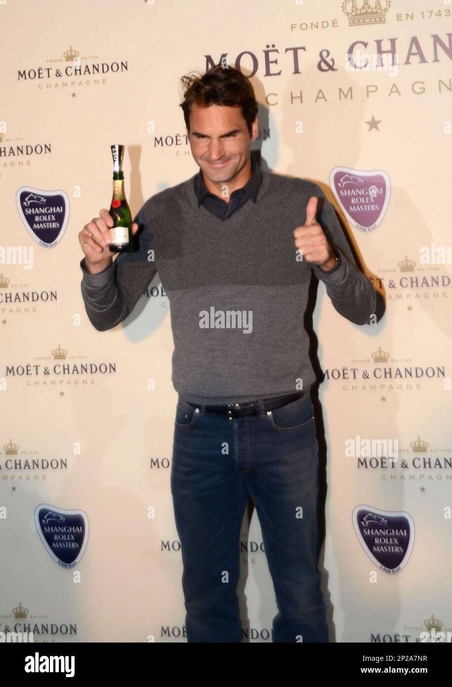 Swiss tennis star Roger Federer poses at the welcome party for the 2015 ...