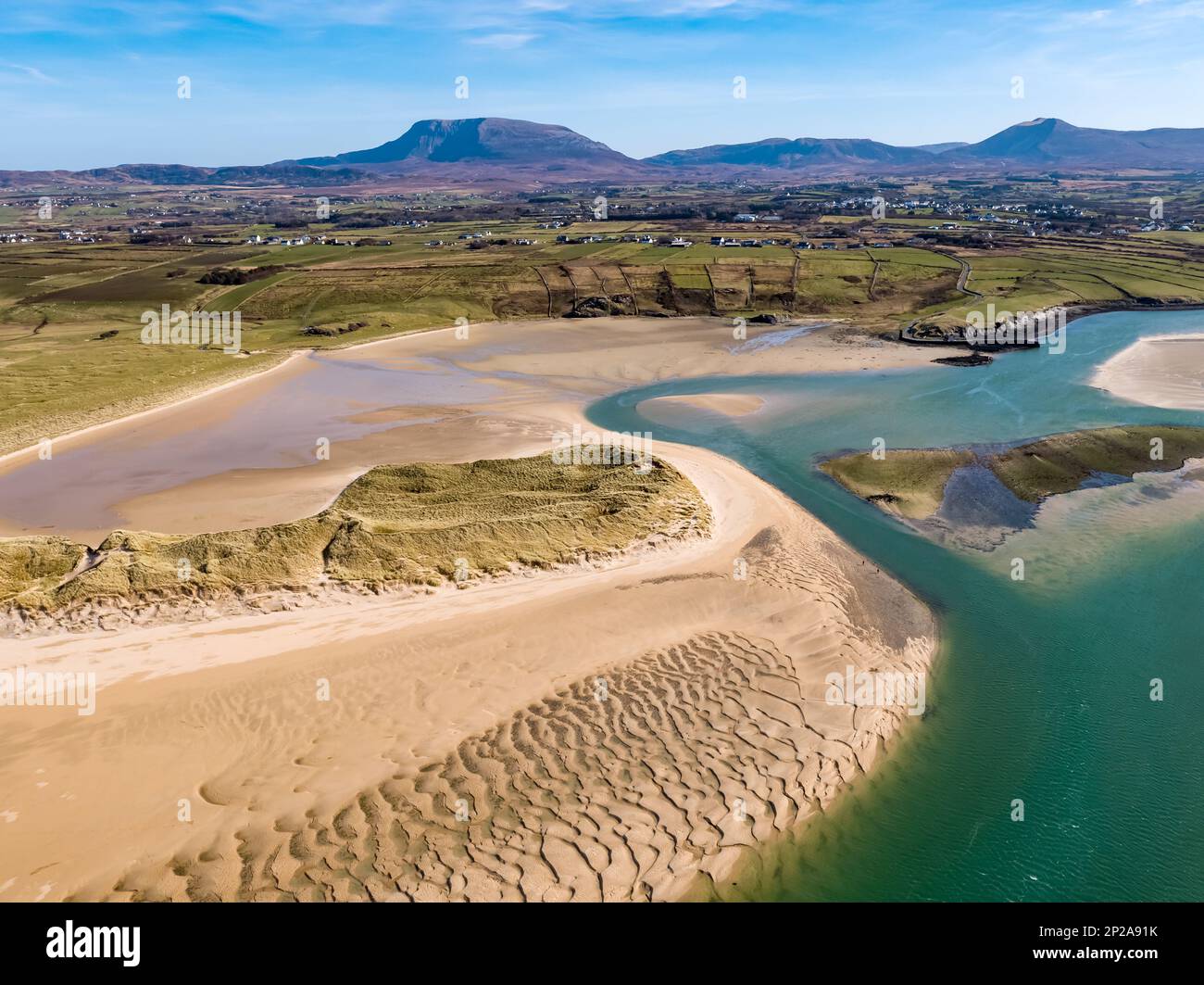 Aerial view of Ballyness Bay and Magheraroarty with the Muckish in the ...