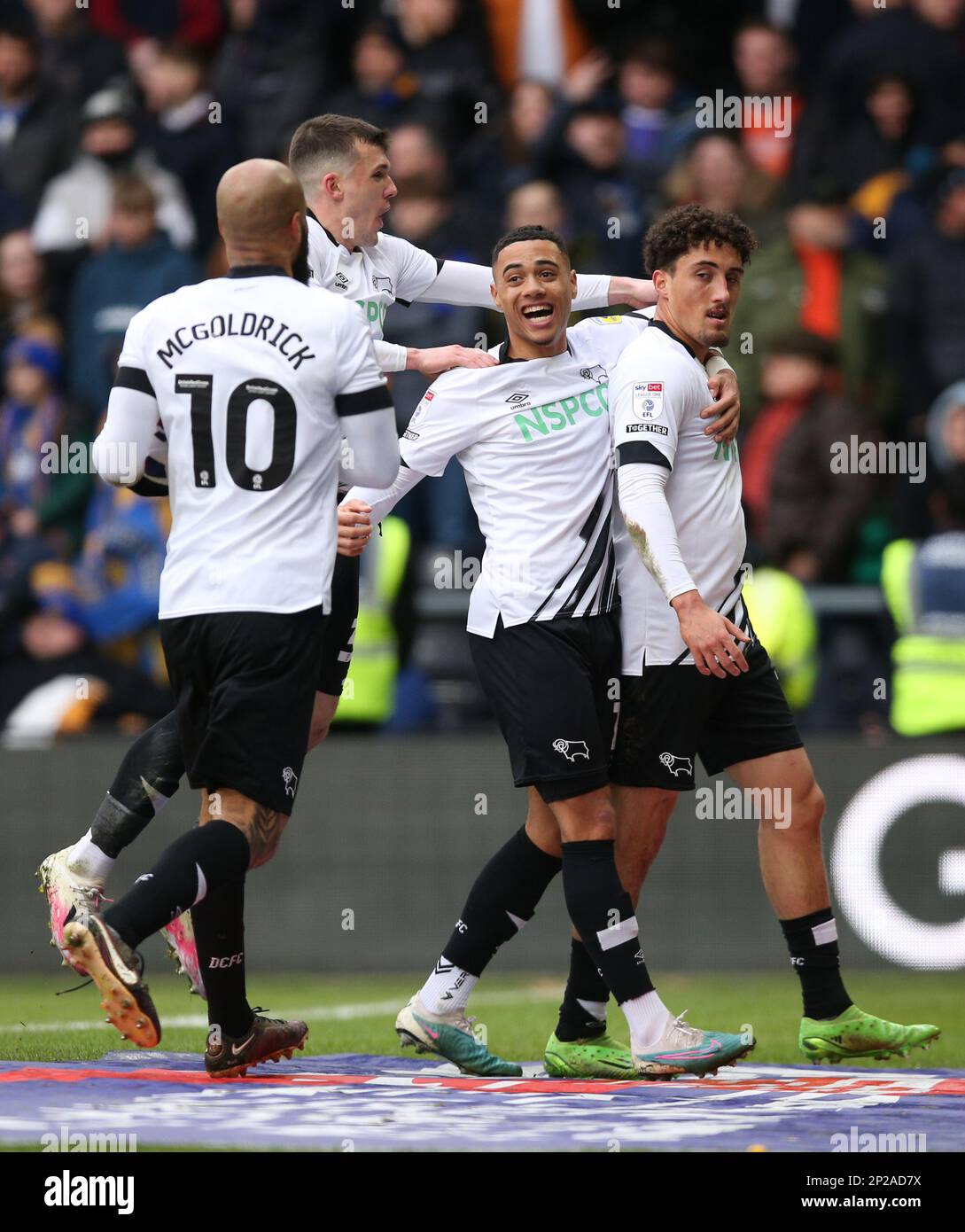 Derby County's Haydon Roberts (right) celebrates scoring their side's ...