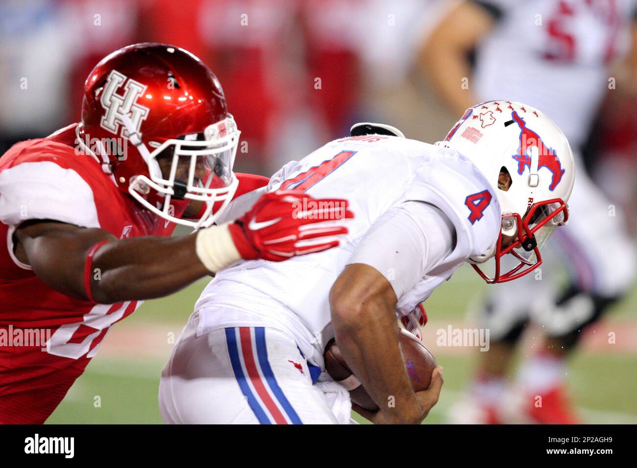 OCT 08 2015: SMU quarterback Matt Davis (4) is sacked from behind by ...