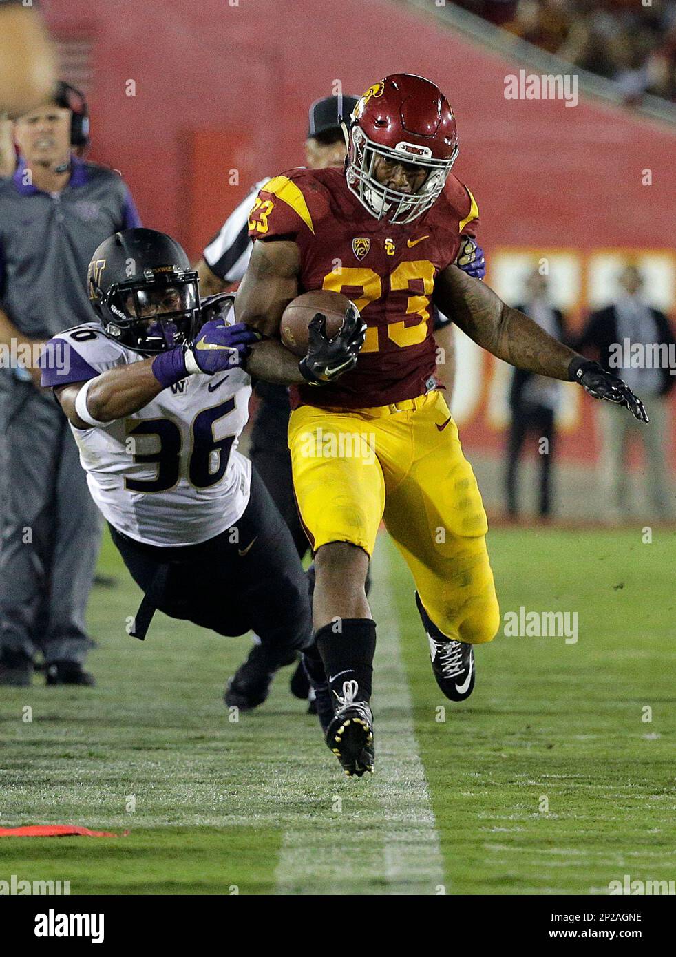 Washington linebacker Azeem Victor, left, grabs Southern California ...