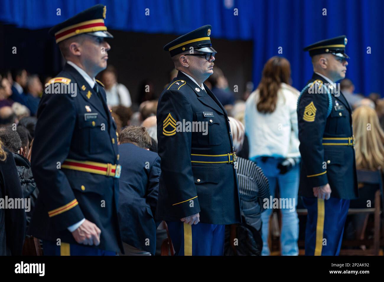 Members of the Connecticut State Guard stand at the position of ...