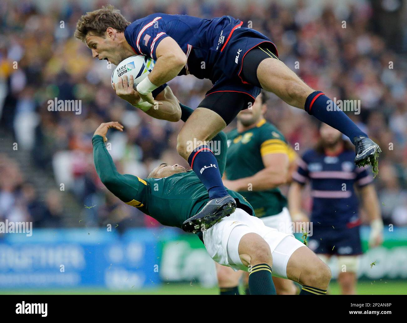 South Africa's Bryan Habana and Blaine Scully of the USA, top, compete ...