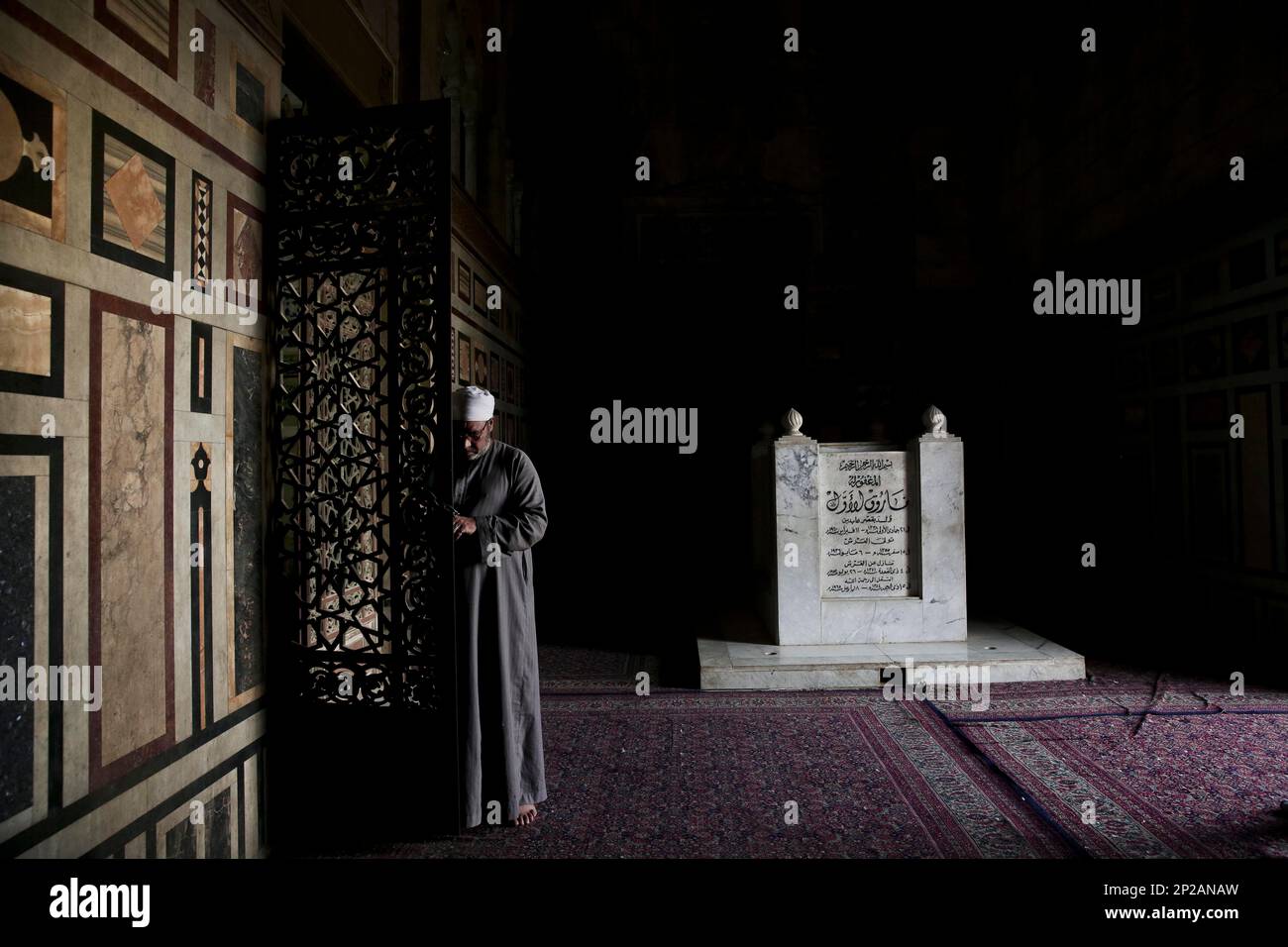 A man opens the doors of Egypt's late King Farouk's tomb, at the Al ...