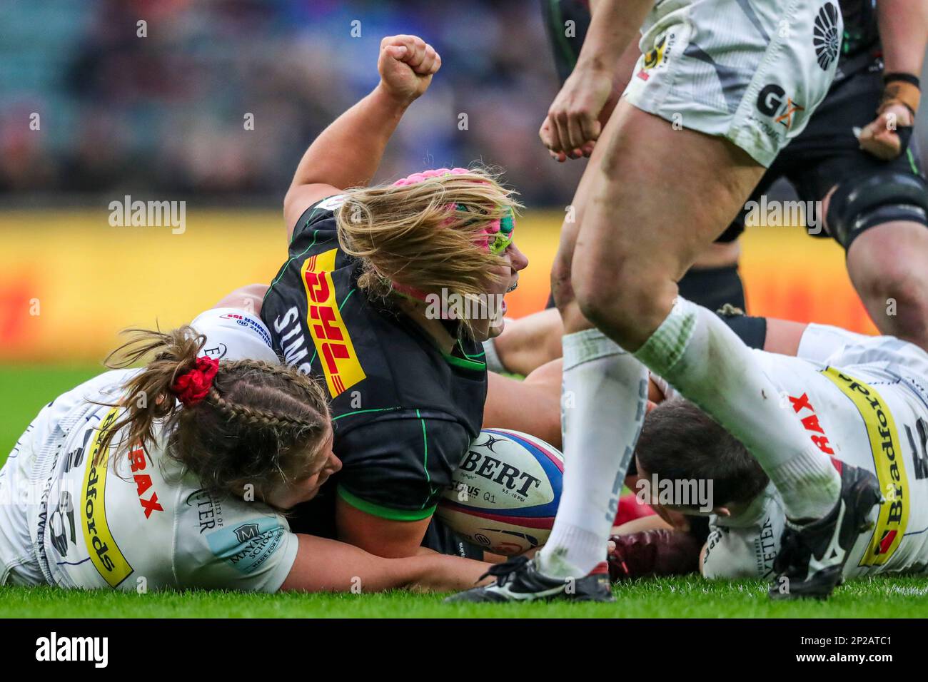 Harlequins' Hannah Sims celebrates after scoring a try during the ...