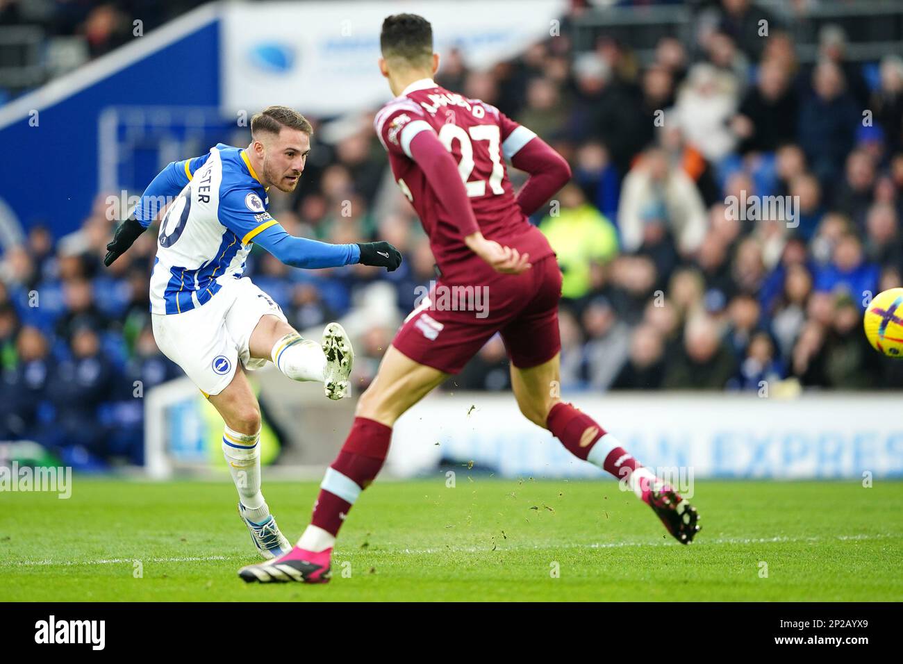 Brighton and Hove Albion's Alexis Mac Allister (left) attempts a shot on goal during the Premier ...