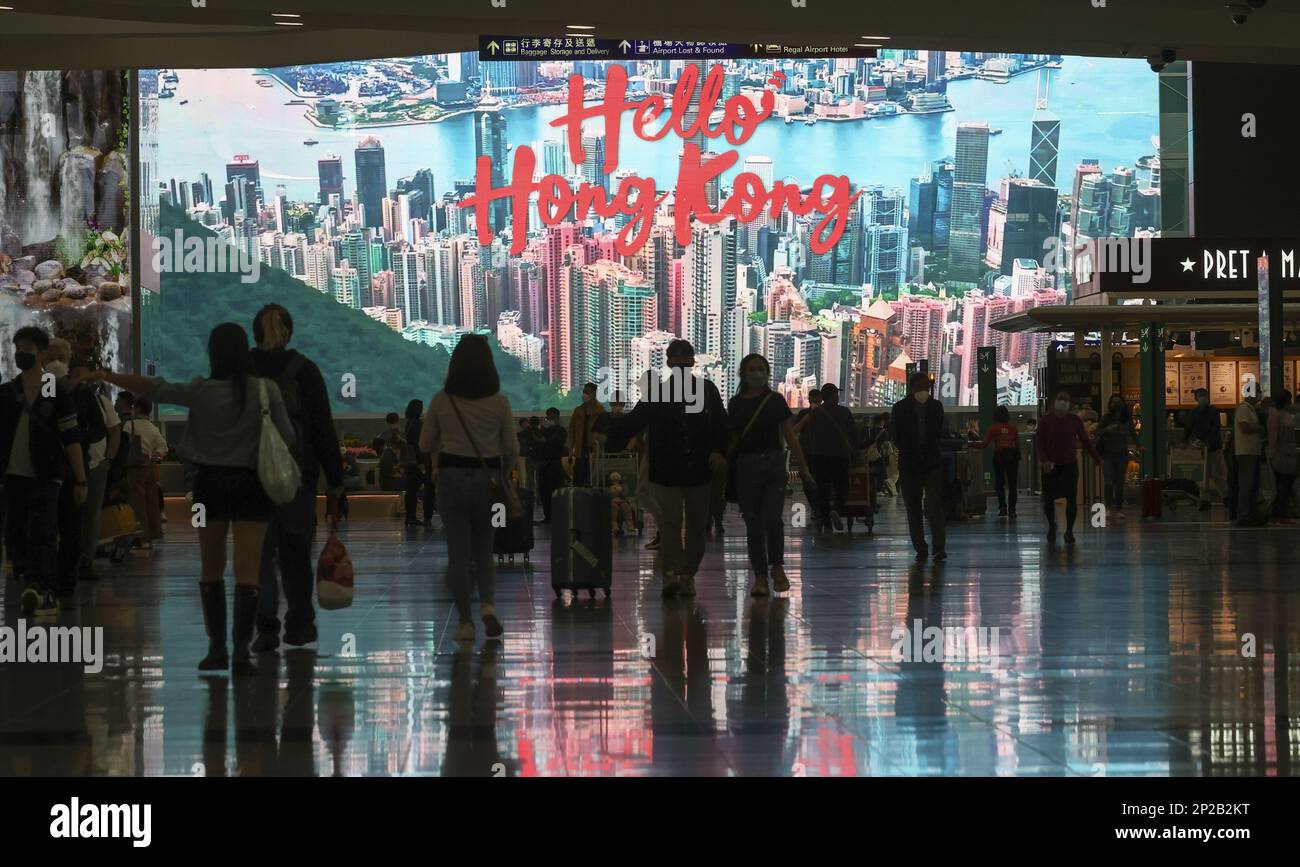 Passengers arrive at the Hong Kong International Airport, Chek Lap Kok ...