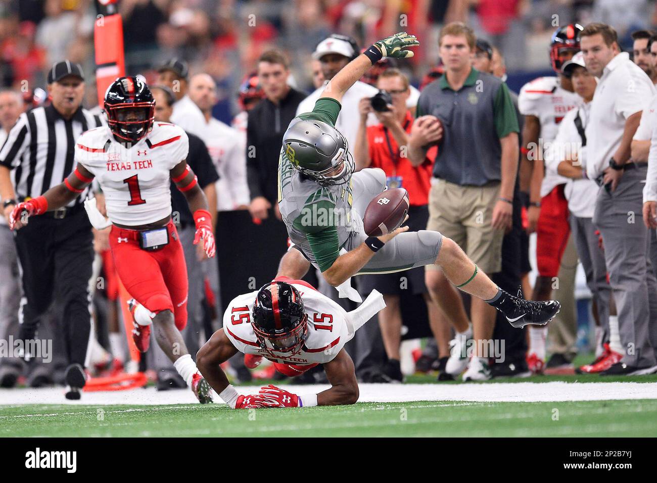 Texas Tech's defensive end Brian Nance (15) defends against a run by ...