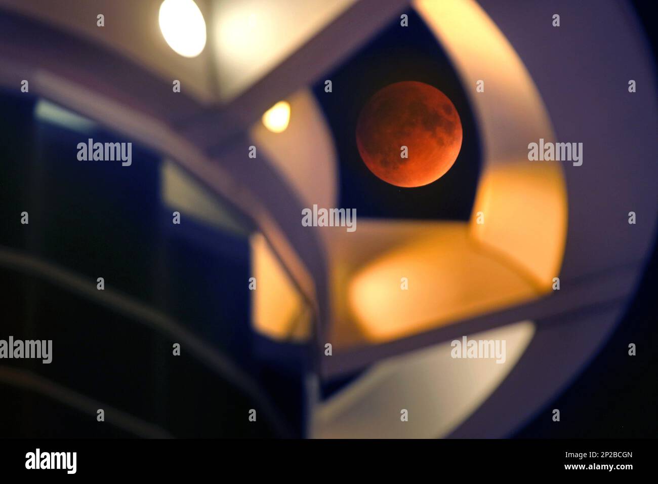 Sunday night's total eclipsed blood moon seen through the tower on the ...