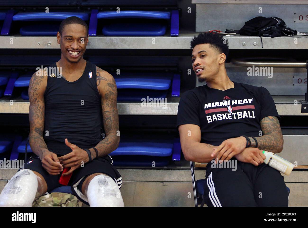 Miami Heat forward Greg Whittington, left, talks with teammate Gerald ...