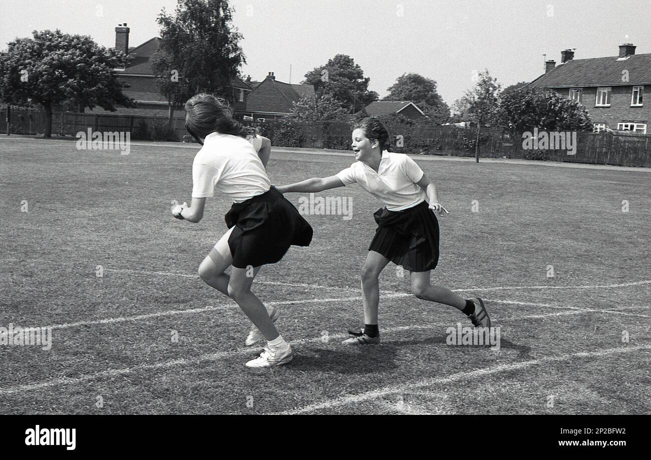 1989, at secondary school sports day, outside on a grass track, two ...