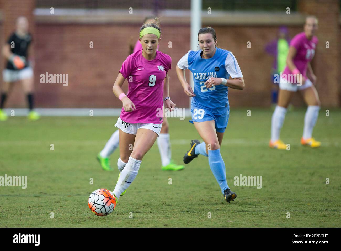 Bayley Feist (9) of the Wake Forest Demon Deacons and Dorian Bailey (29 ...