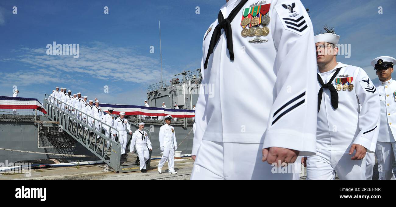 The last crew of the USS Simpson disembark at Naval Station Mayport ...