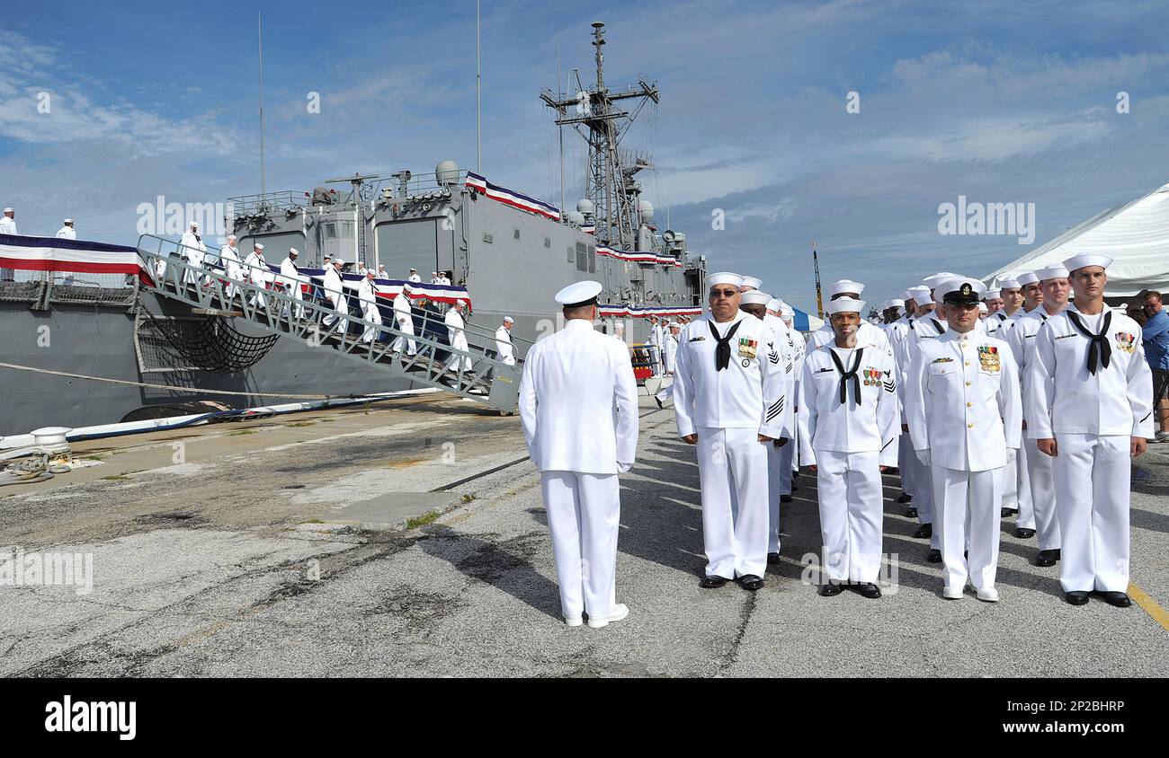 The last crew of the USS Simpson disembark at Naval Station Mayport ...