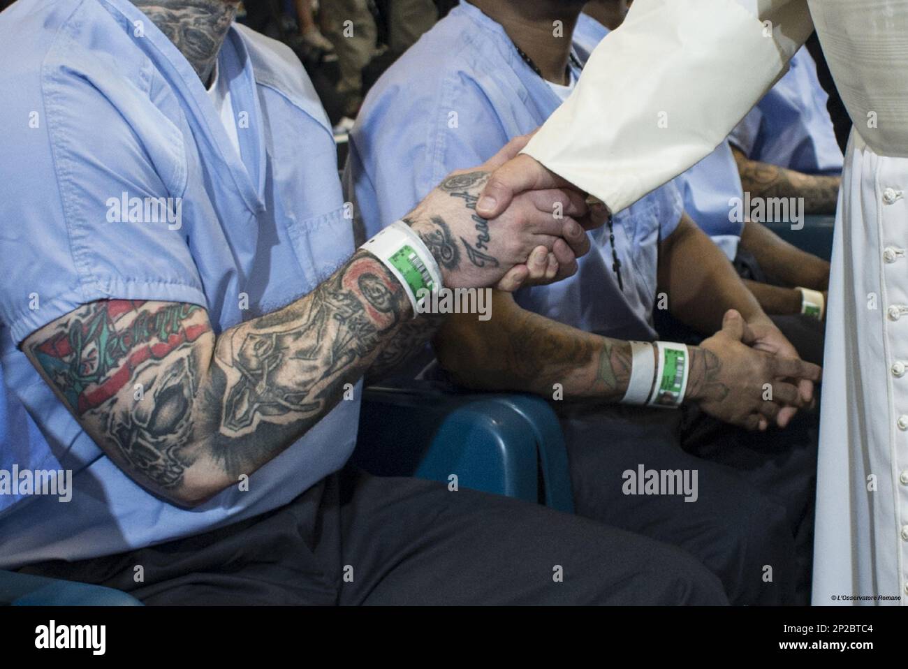 In this photo taken on Sunday Sept. 27, 2015 Pope Francis shakes hands ...