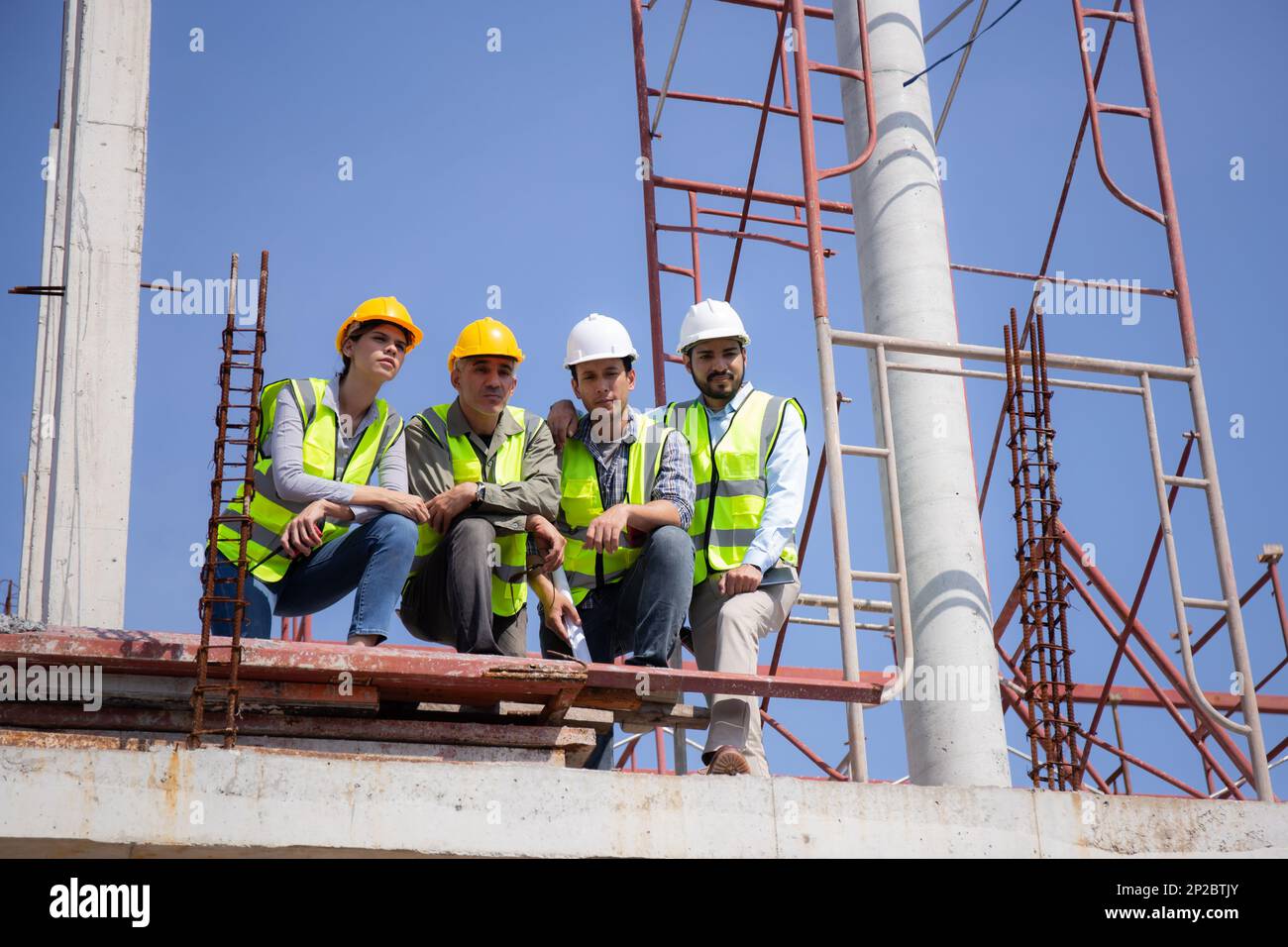 Team group of contractor and architect with foreman explaining about ...