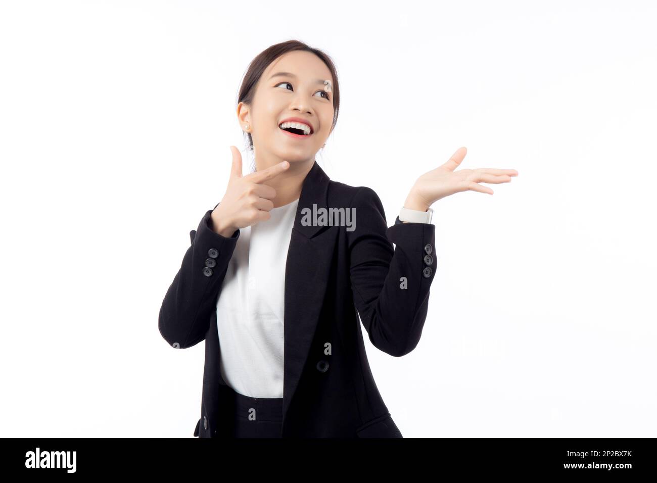 Portrait young asian business woman pointing and presenting isolated on ...