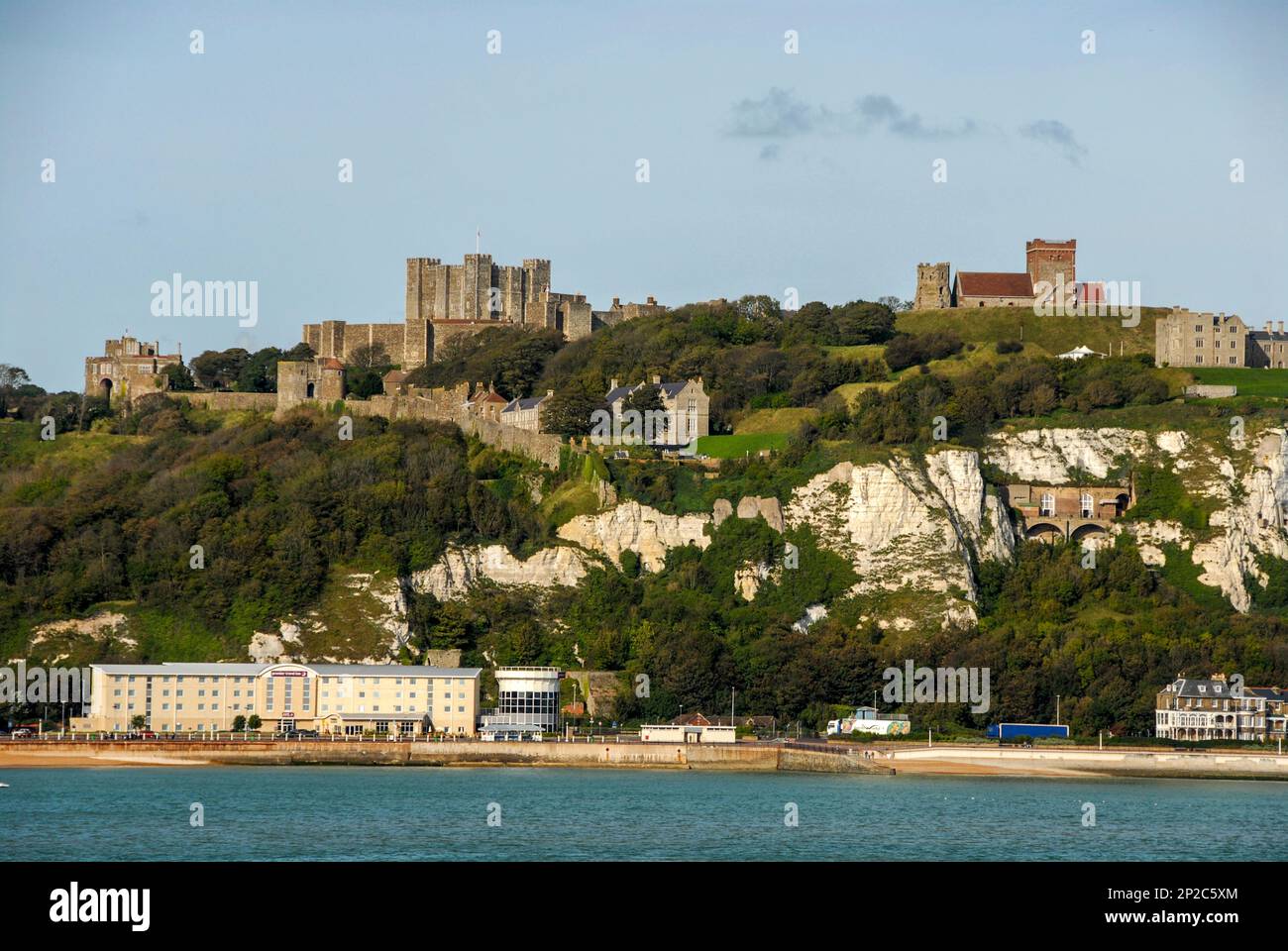 The medieval Dover Castle sits on top of the White Cliffs of Dover in ...