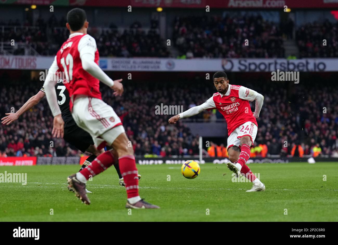 Arsenal's Reiss Nelson scores his sides third goal of the game during ...
