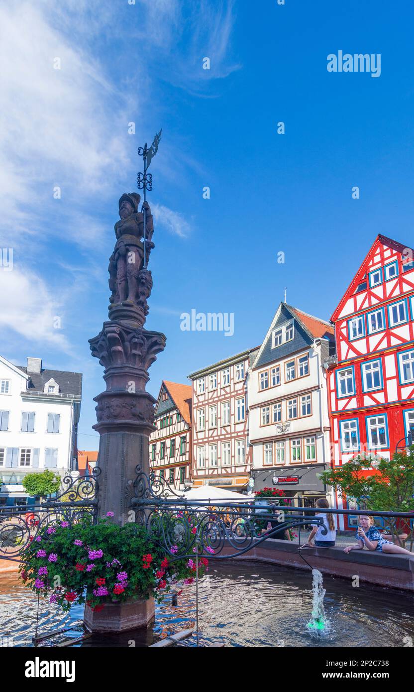 Butzbach: square Marktplatz with fountain, Old Town, half-timbered ...
