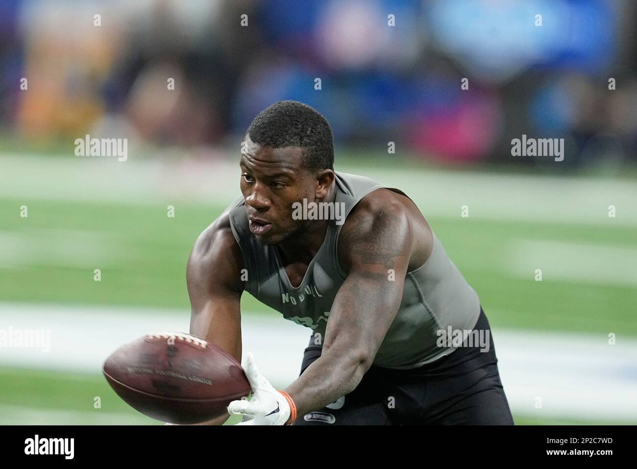 Virginia defensive back AJ Johnson runs a drill at the NFL football ...
