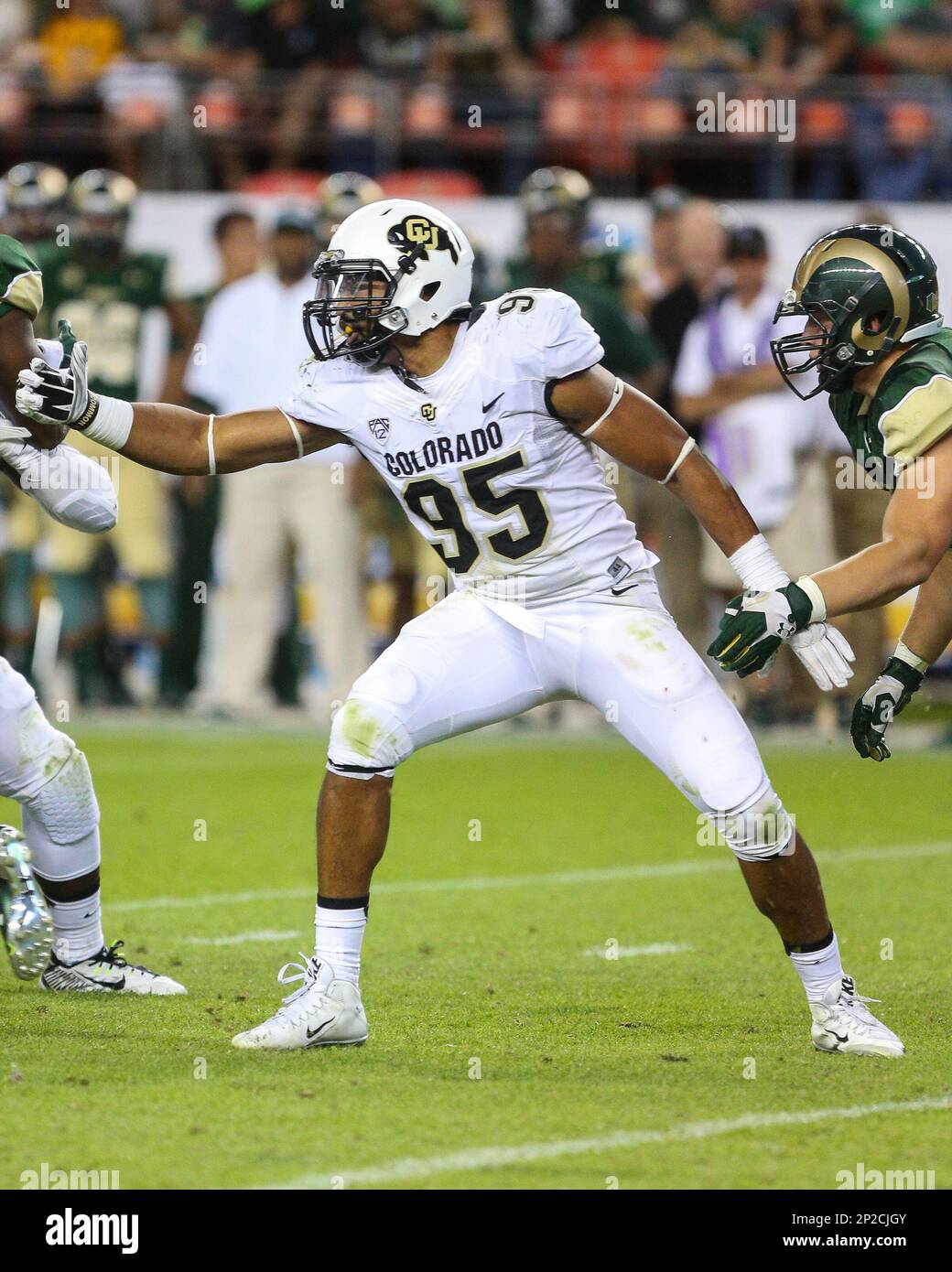 September 19, 2015: Colorado defensive lineman Derek McCartney tries to ...