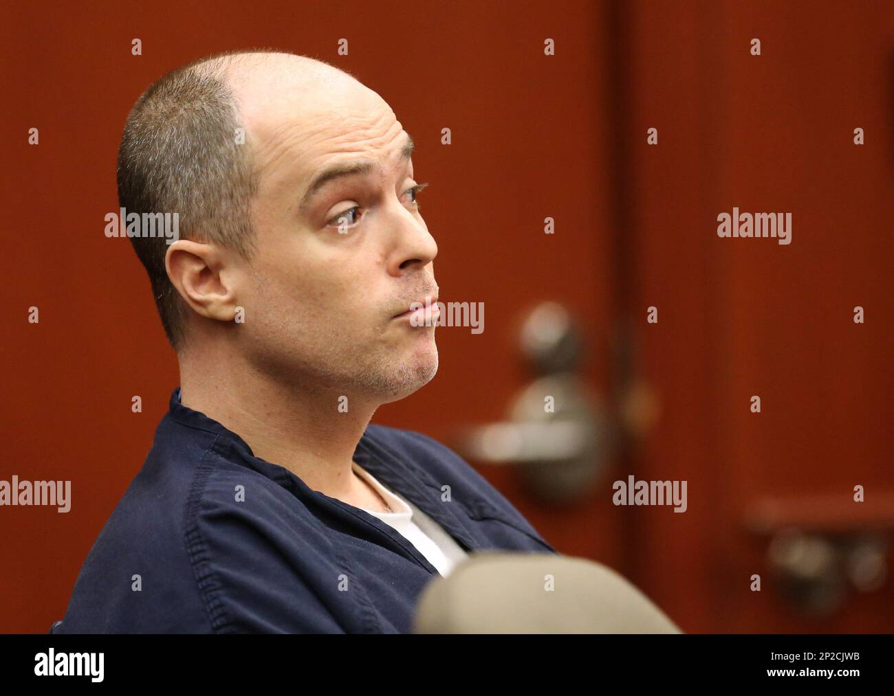 Defendant Matthew Apperson reacts to testimony from George Zimmerman ...