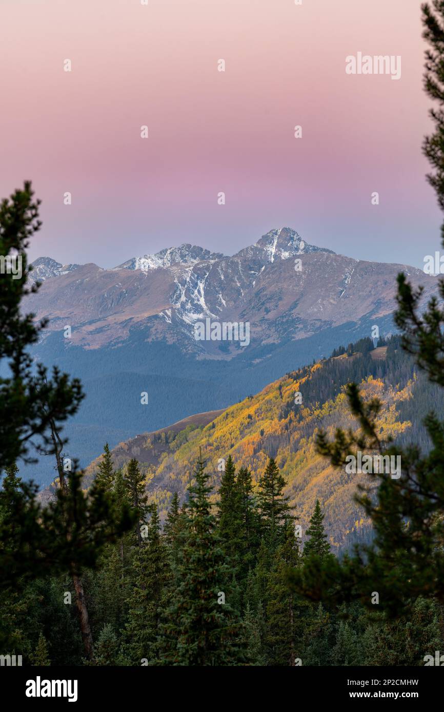 Fall colors during sunrise below Mt. of the Holy Cross near Vail ...
