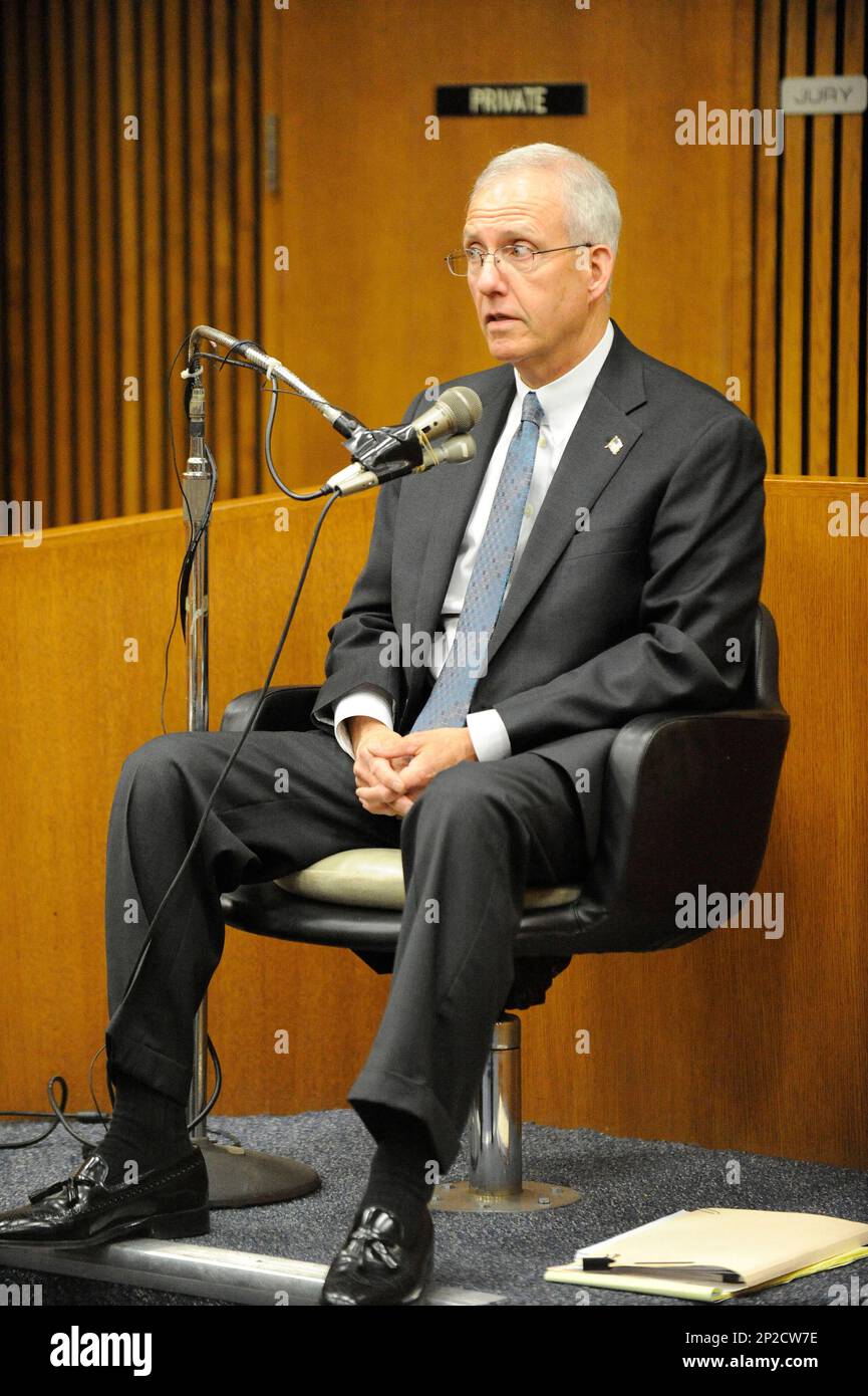 Defense attorney Michael McCarthy sits on the witness stand in Judge ...